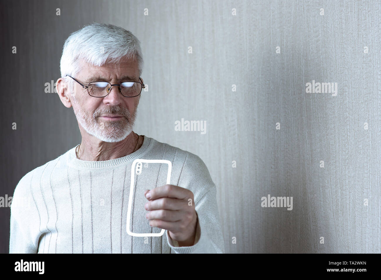 a gray-haired man in light clothes with a phone is thinking about ...