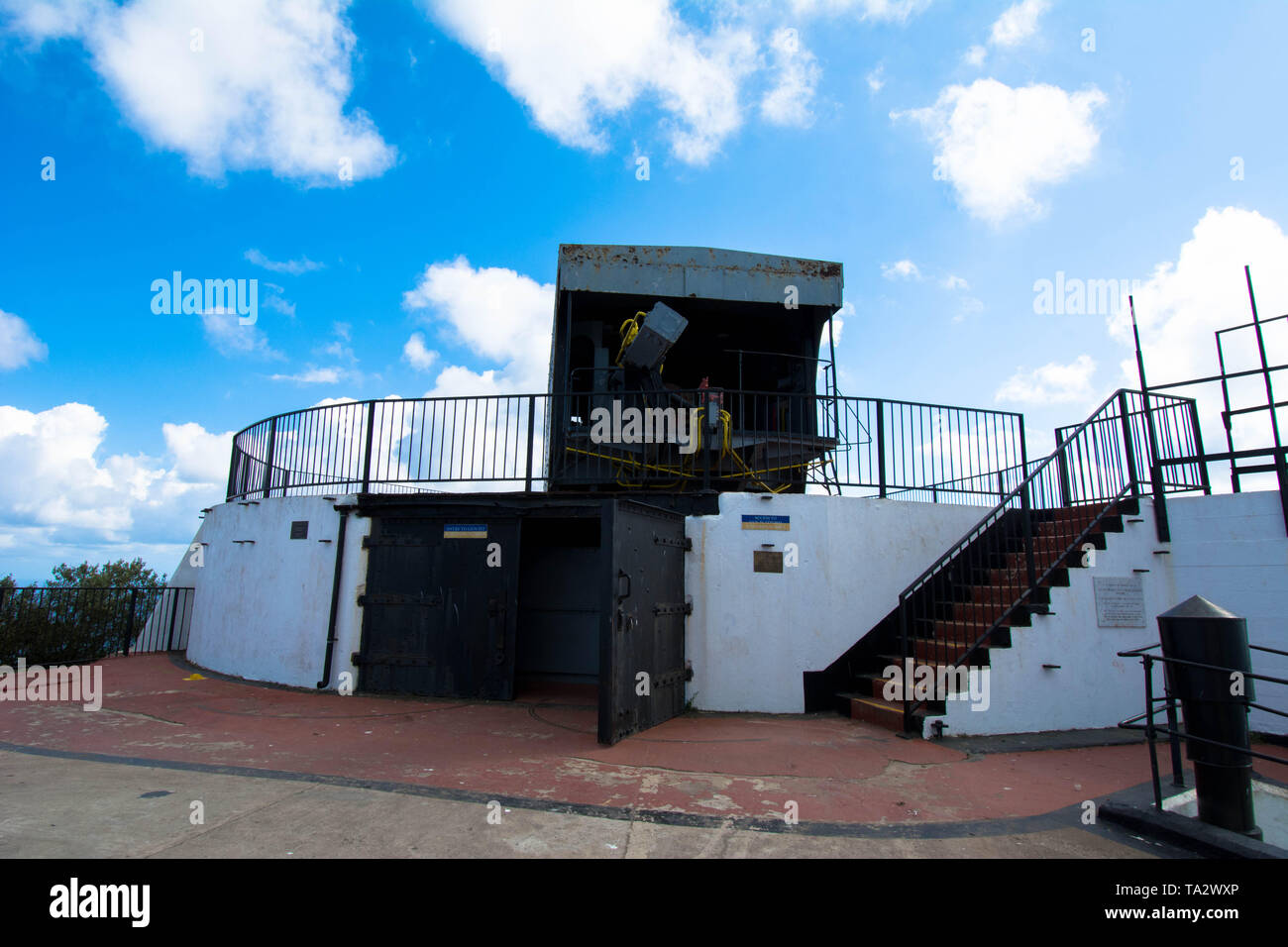 Gun large big on Rock of Gibraltar steps lookout cloud sunny rail ...
