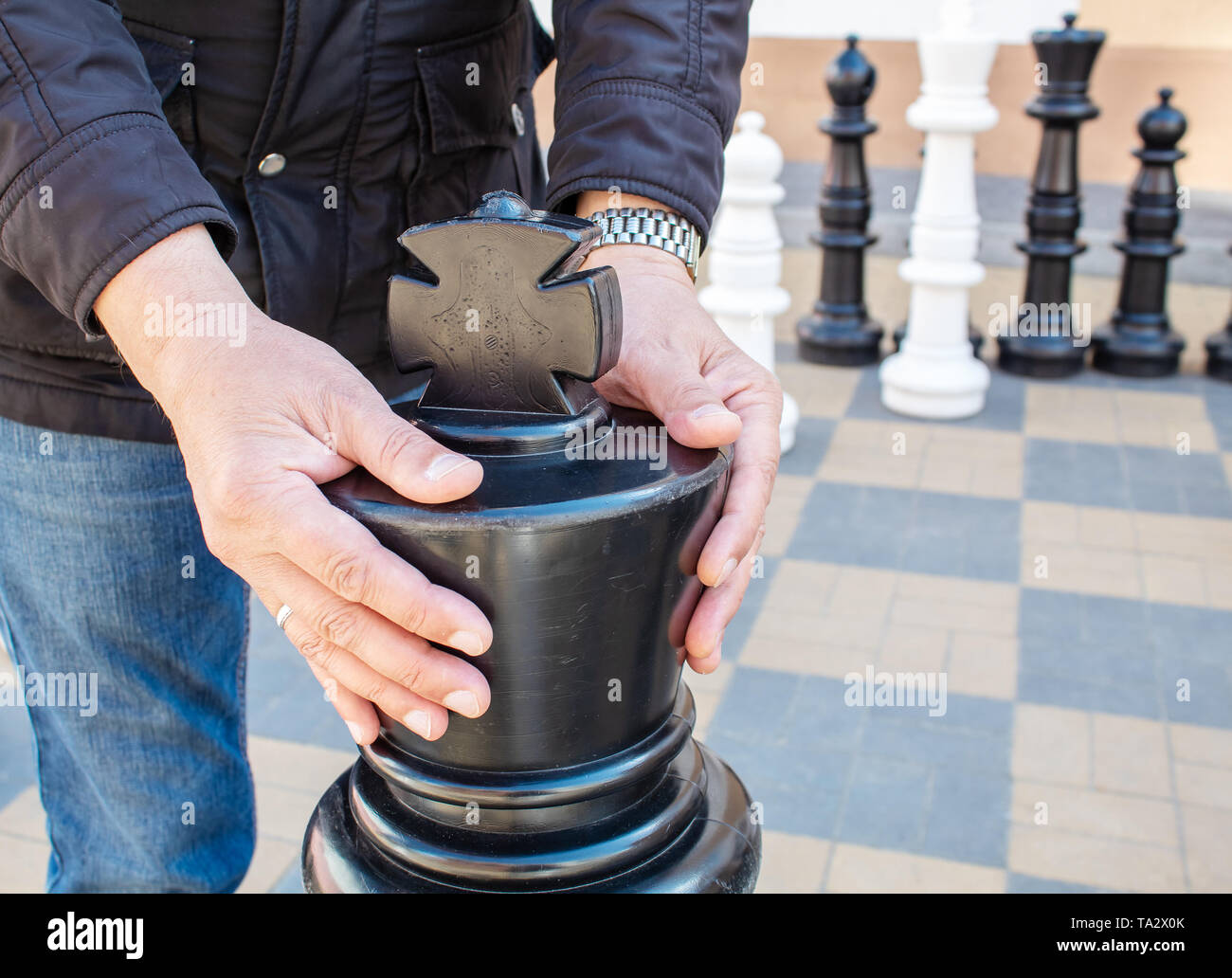Hand moving pawn chess piece hi-res stock photography and images - Alamy