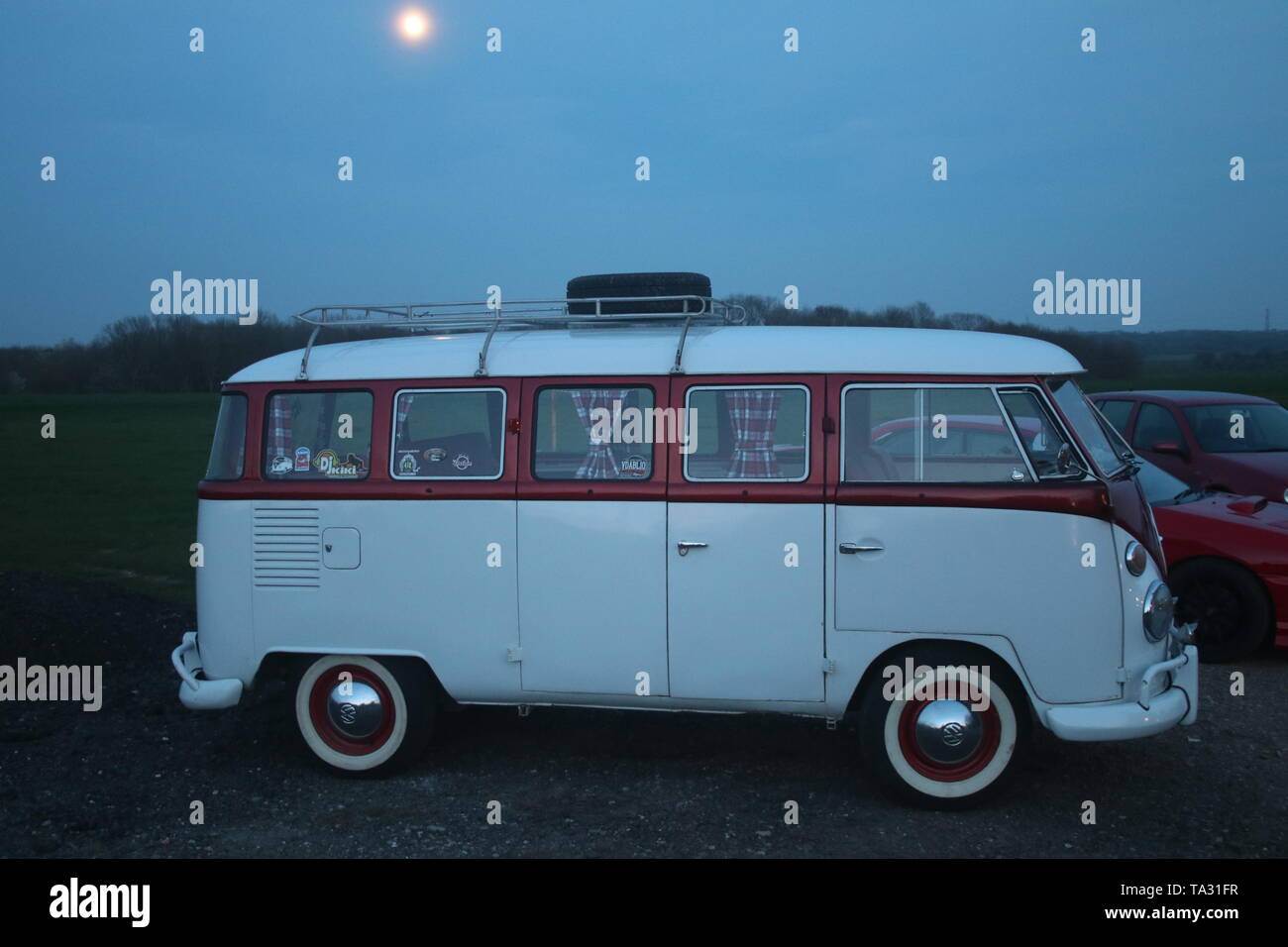 A DUSK SIDE VIEW PHOTO OF A RETRO CLASSIC SPLIT-SCREEN VW VOLKSWAGEN ...