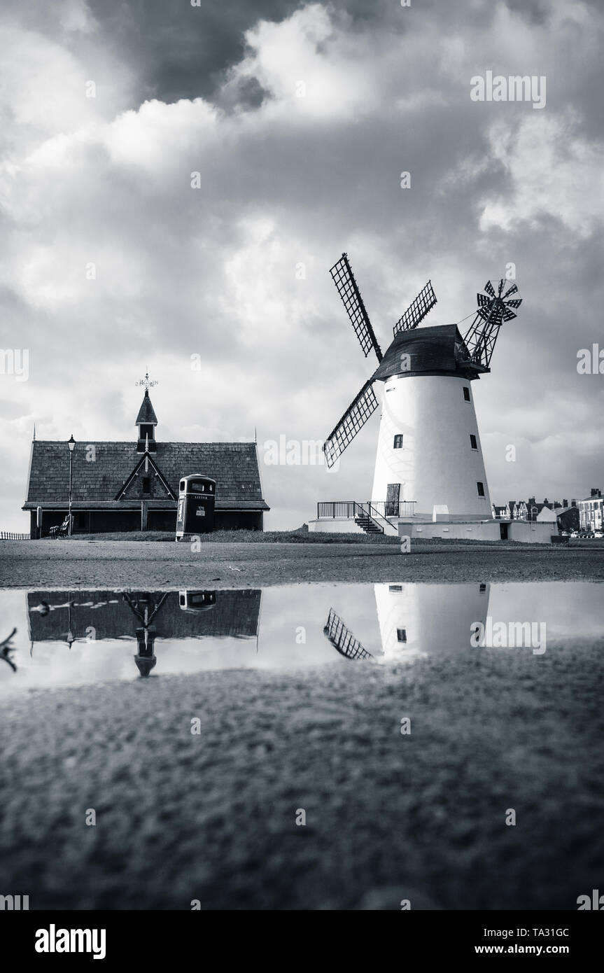 Lytham Windmill reflected in a puddle Stock Photo - Alamy