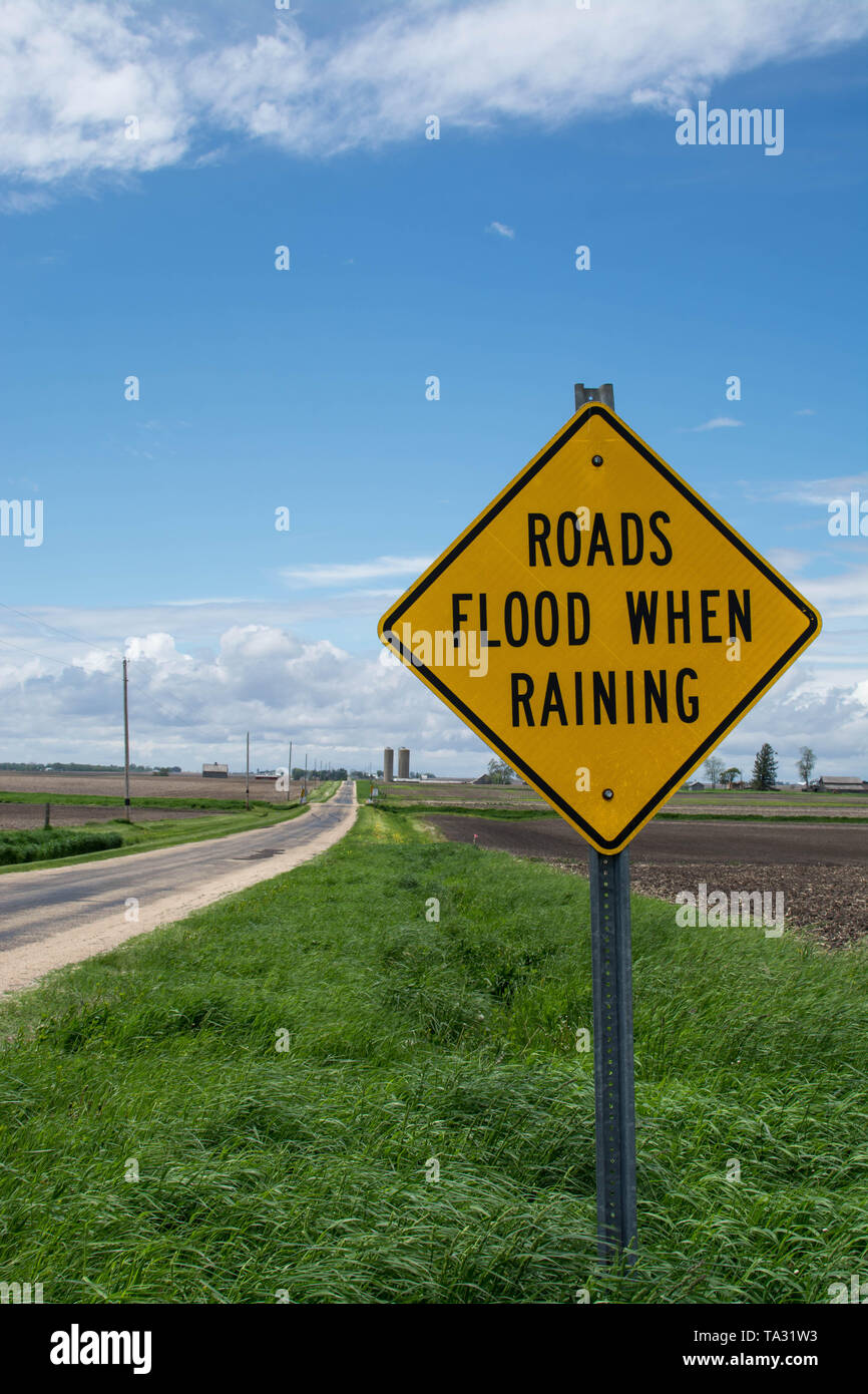 Roads flood when raining warning sign in rural Illinois Stock Photo - Alamy