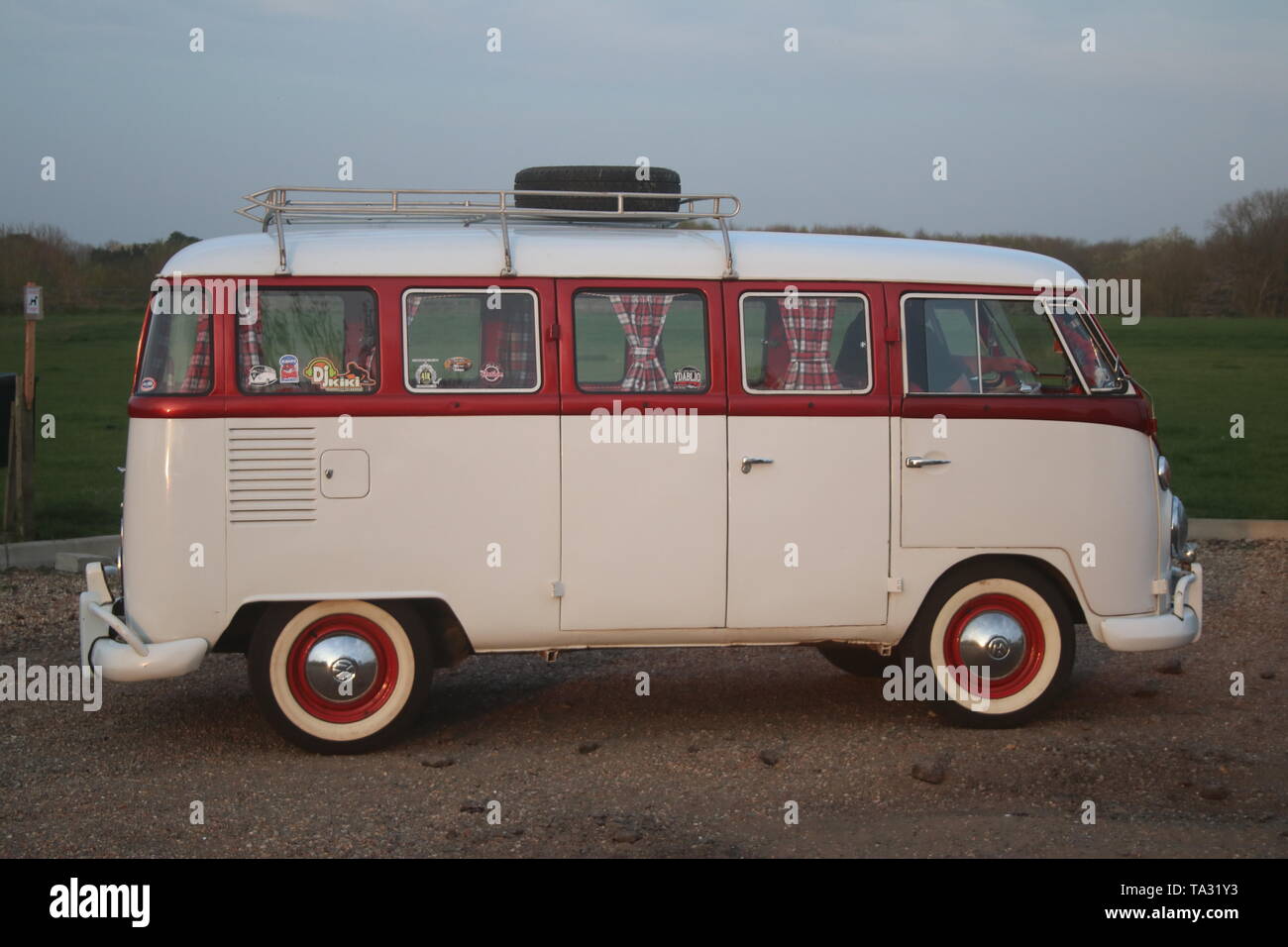 A DUSK SIDE VIEW PHOTO OF A RETRO CLASSIC SPLIT-SCREEN VW VOLKSWAGEN ...