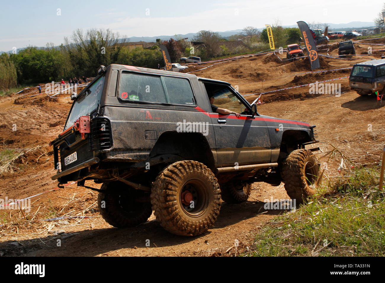 Four wheel drive cars tackling a mud circuit in Spain Stock Photo - Alamy