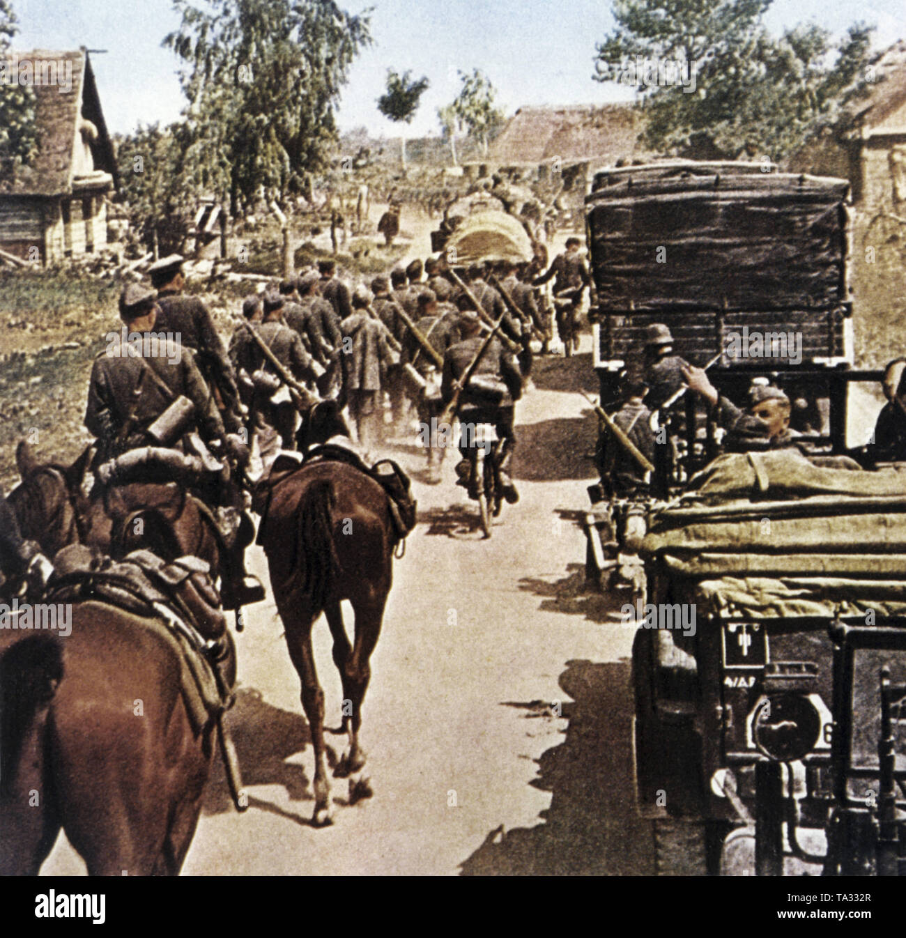 A German column consisting of trucks and horses on the advance of the ...