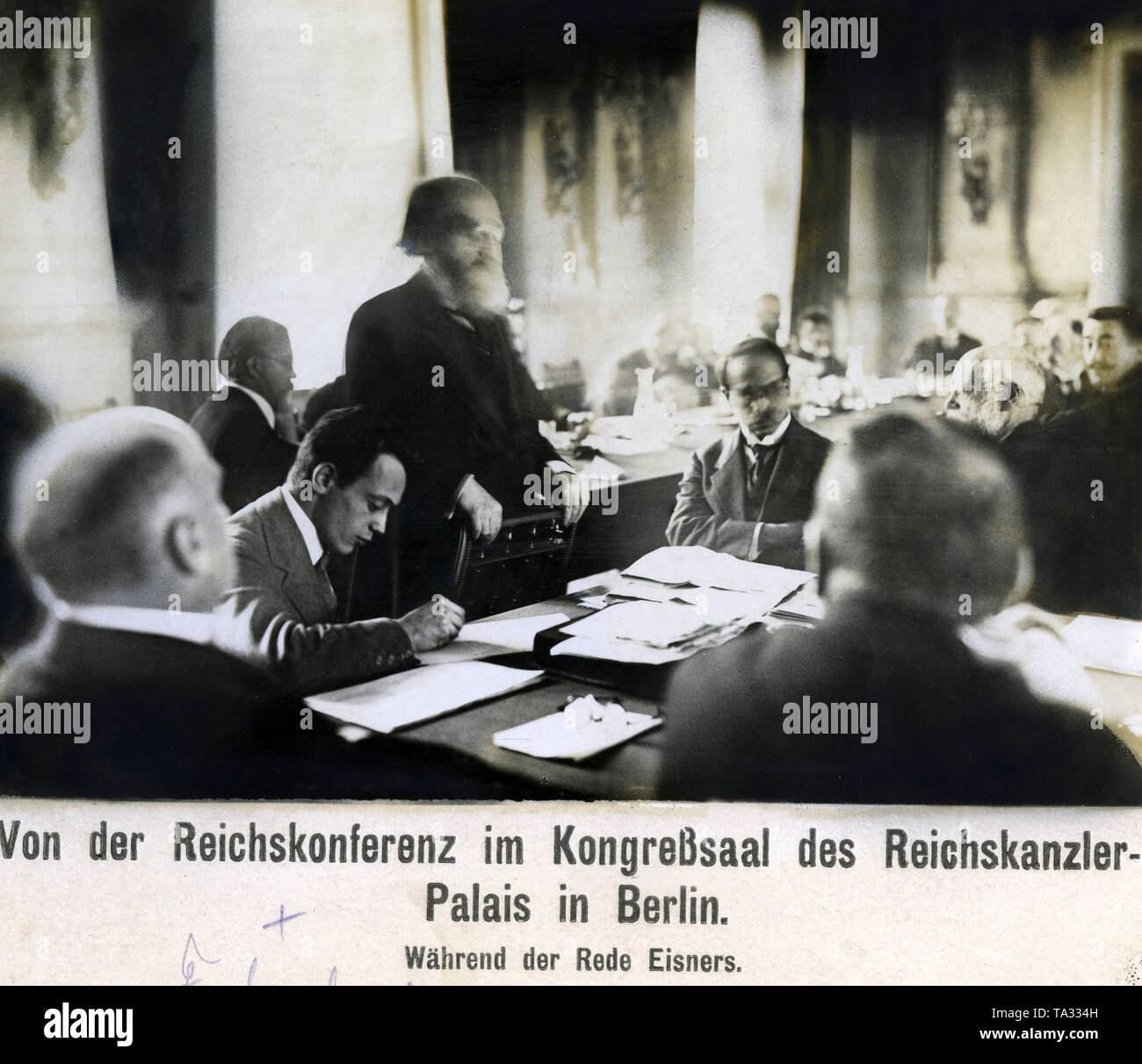 Kurt Eisner (standing) speaks at a meeting of the Imperial Congress of ...
