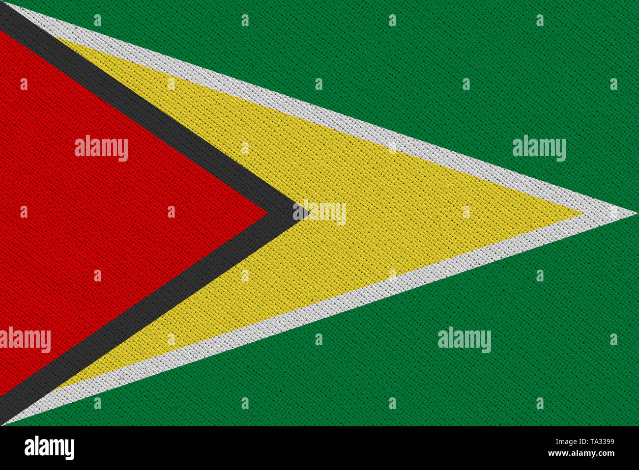 Guyana fabric flag. Patriotic background. National flag of Guyana Stock Photo - Alamy