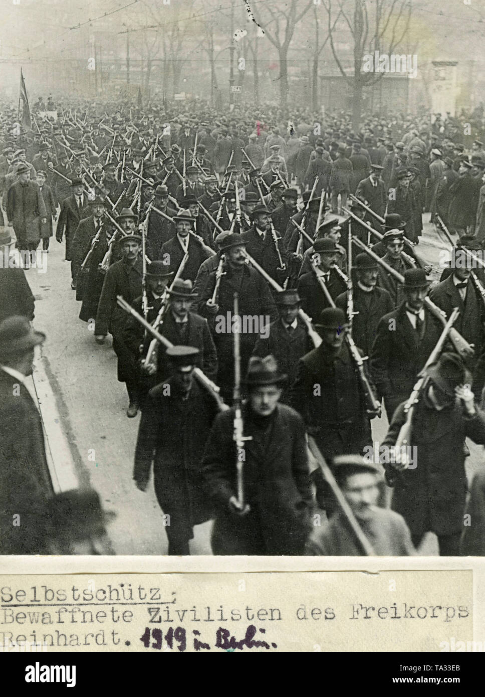 Armed civilians of Freikorps Reinhard march through Berlin. The ...