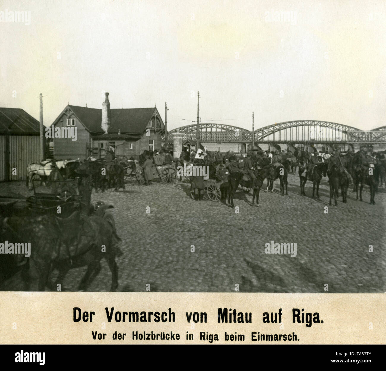 Units of the Freikorps "Iron Division" in front of the wooden bridge in ...