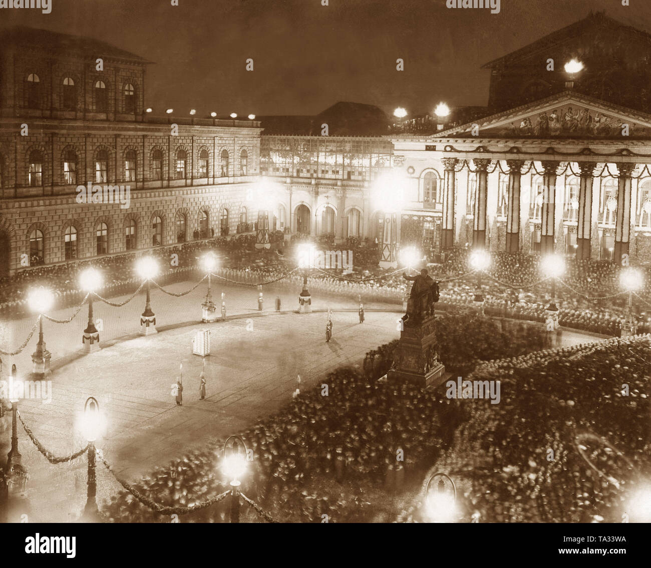 Crowd at the Max-Josef-Square in Munich which is festively decorated ...