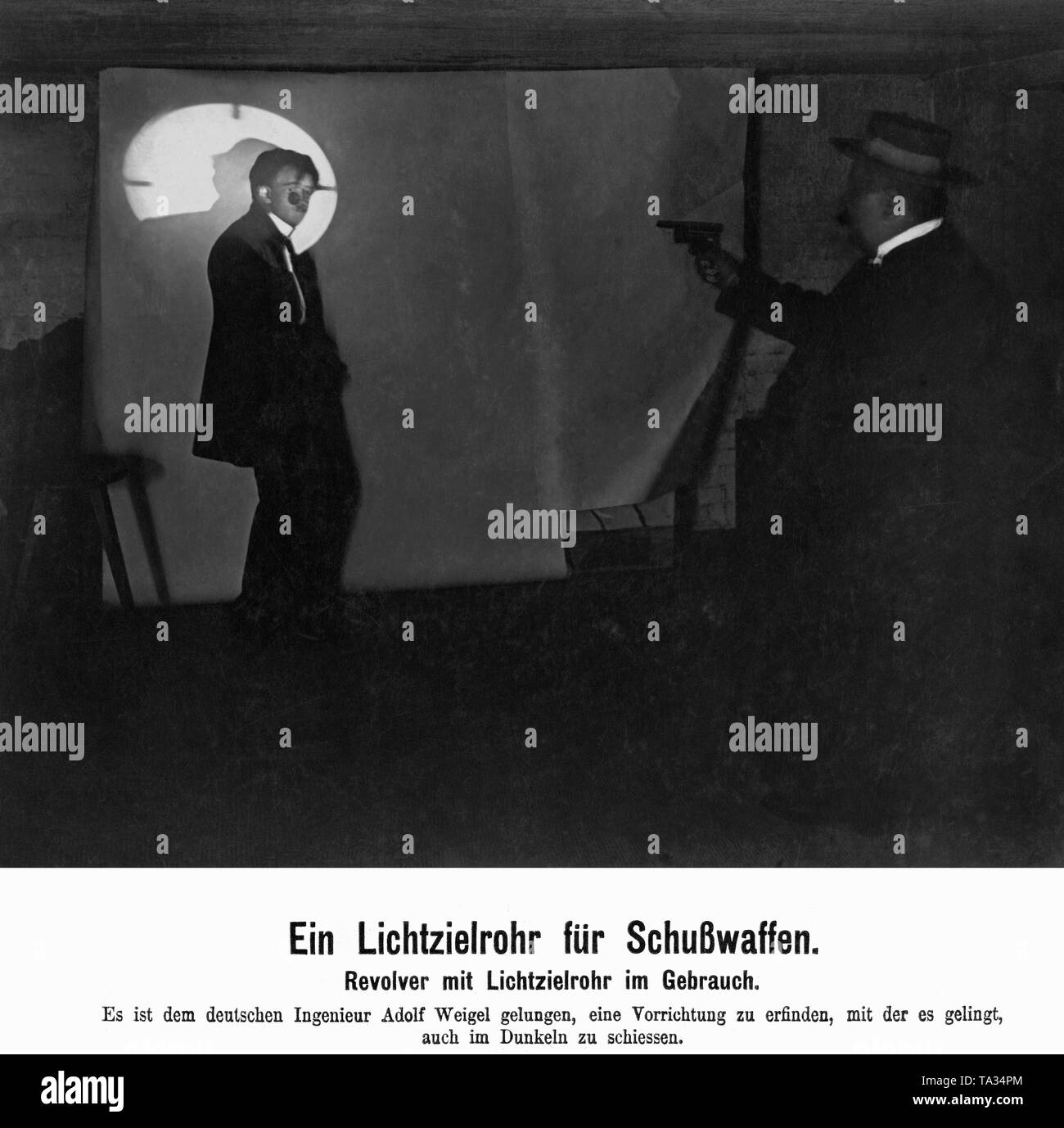 The German engineer Adolf Weigel connected a lamp to a revolver Stock ...