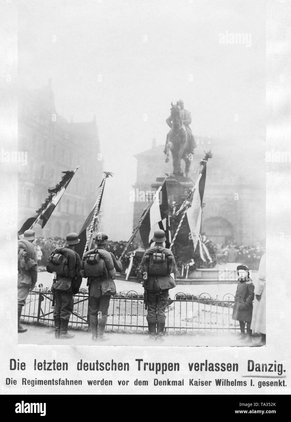 This photograph shows members of the German troops, who lower the ...