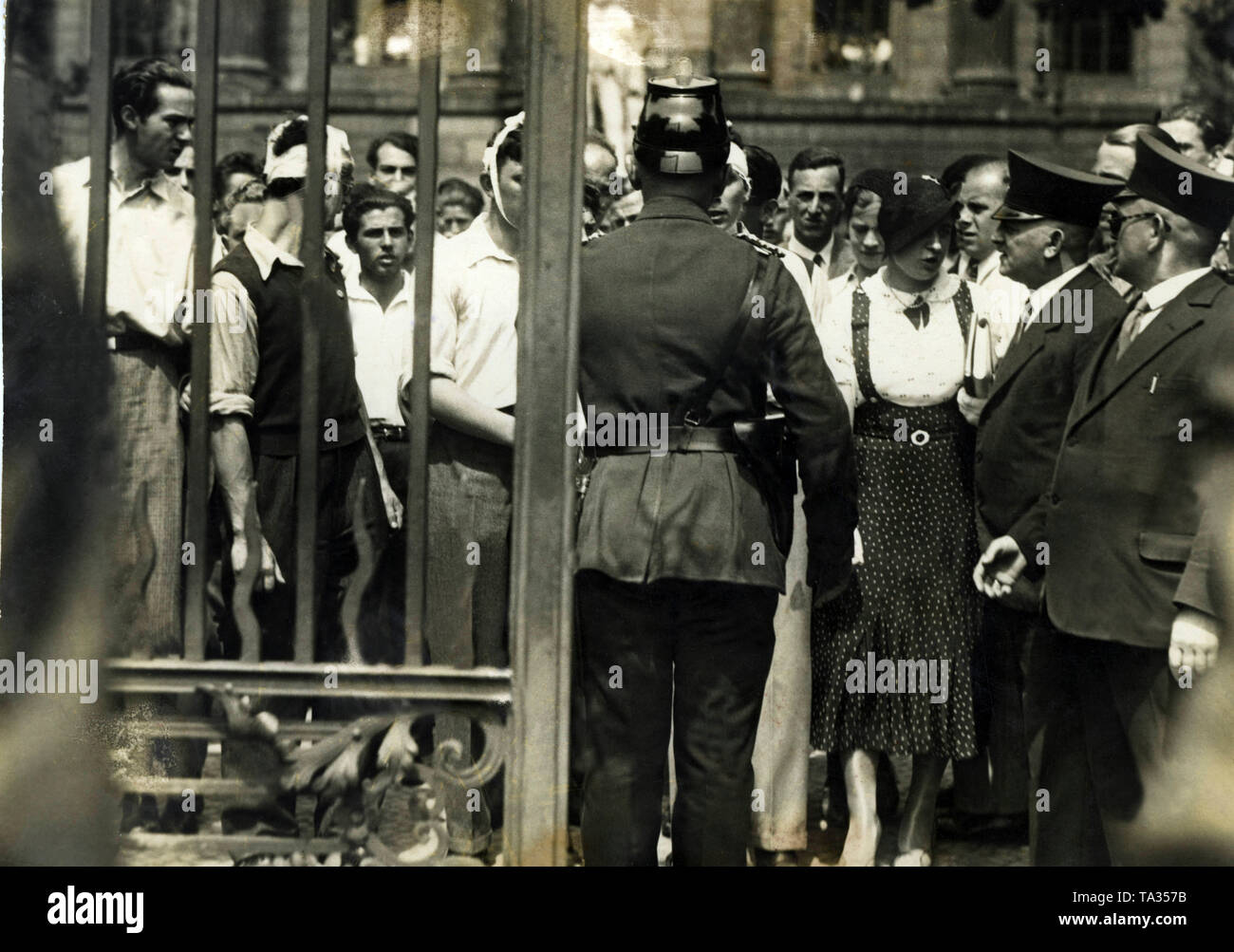 A group of communist students in front of the closed university of ...