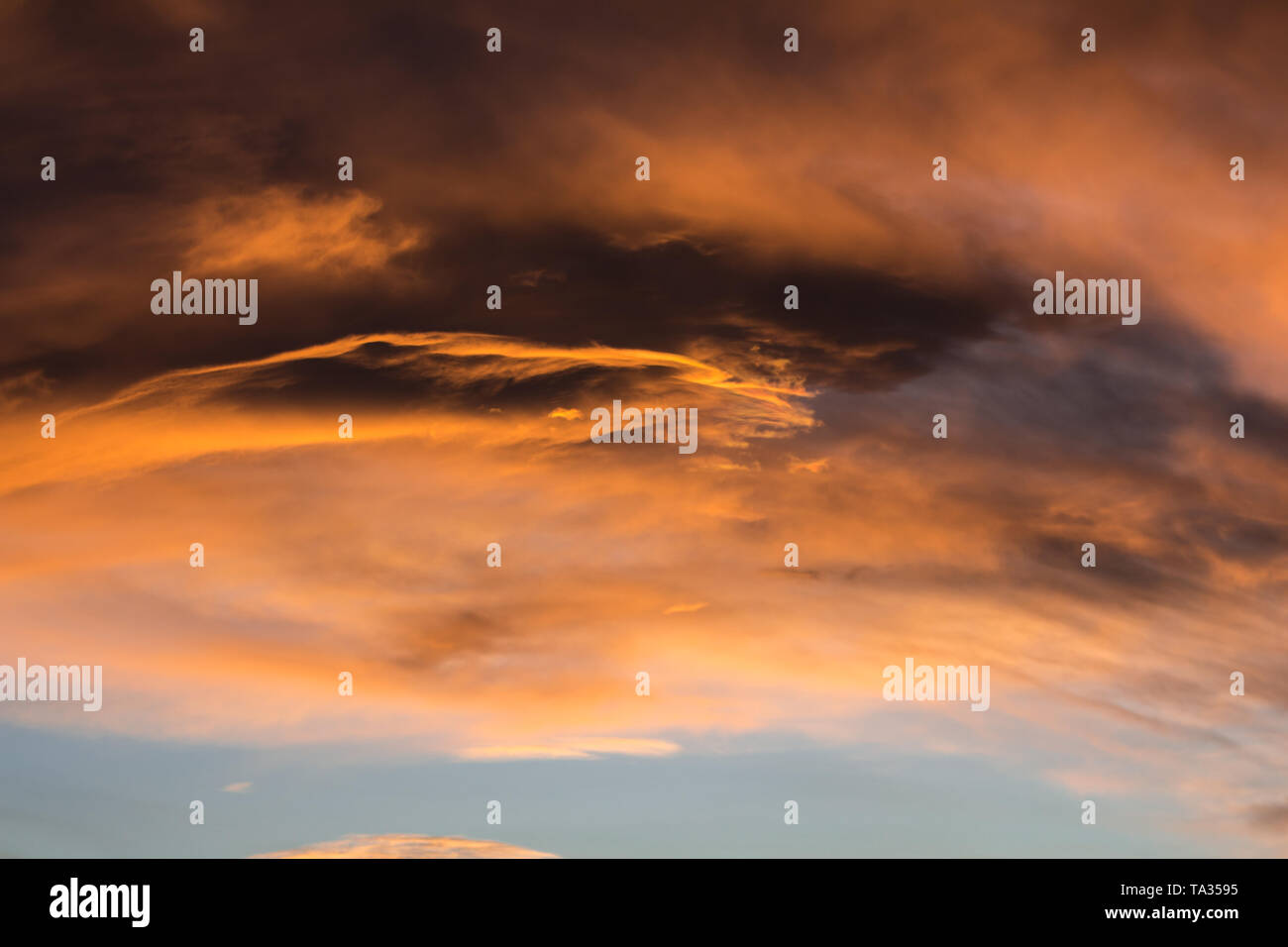 Clouds illuminated by morning sun Stock Photo - Alamy