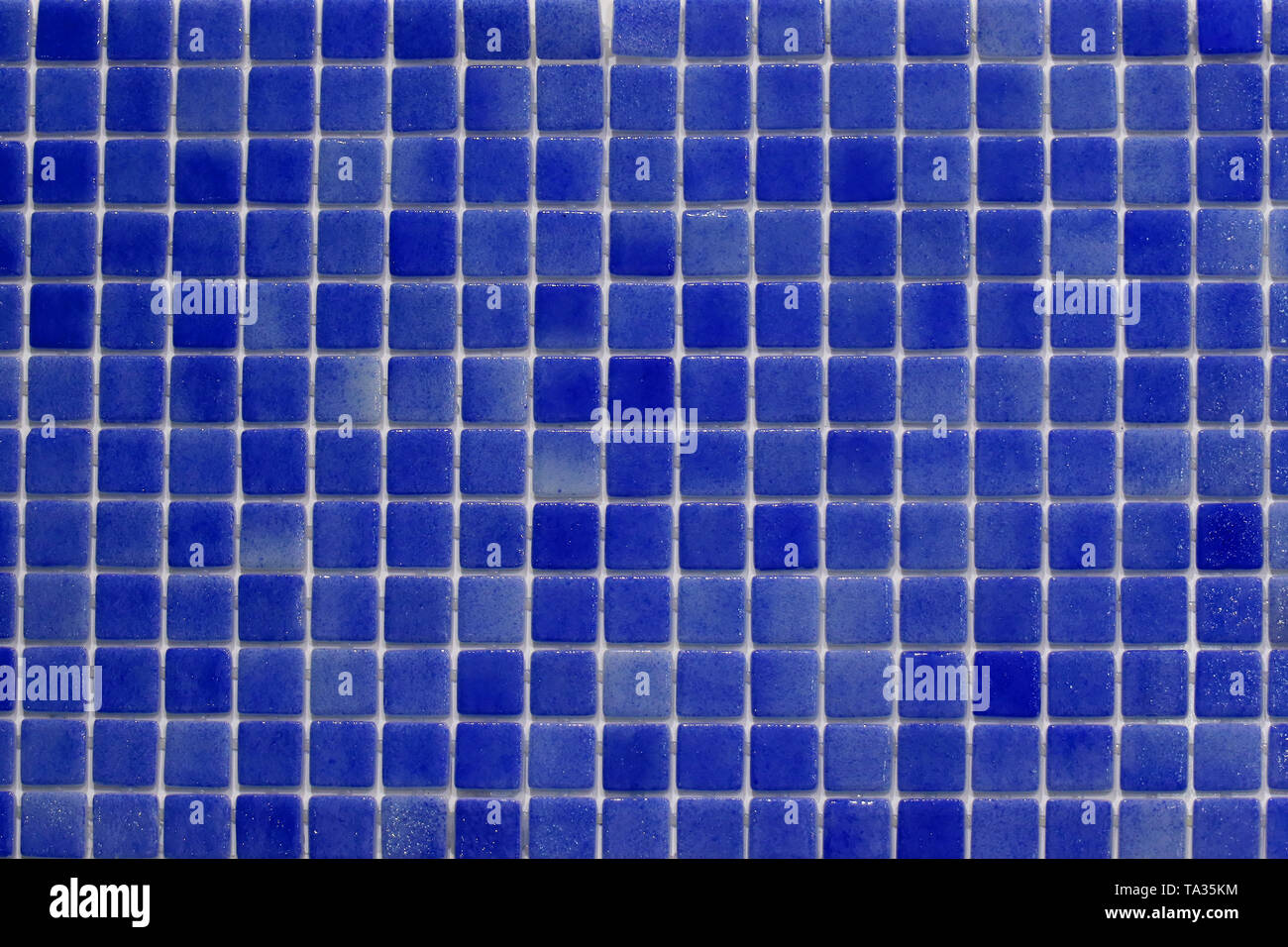 Dark blue ceramic square tiles pattern background Stock Photo - Alamy