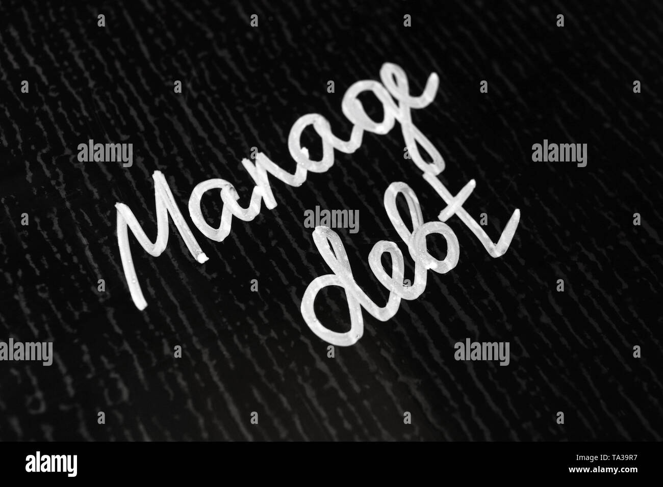 Manage the debt hi-res stock photography and images - Alamy