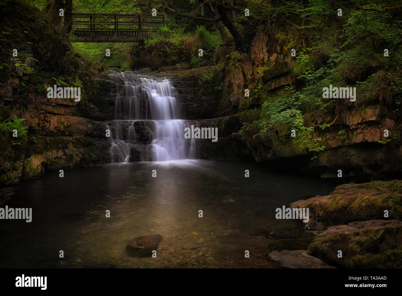 Dinas Rock waterfall Stock Photo - Alamy