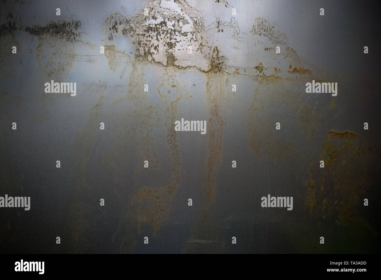 real thin flat sheet metal background with dark corners and light ...