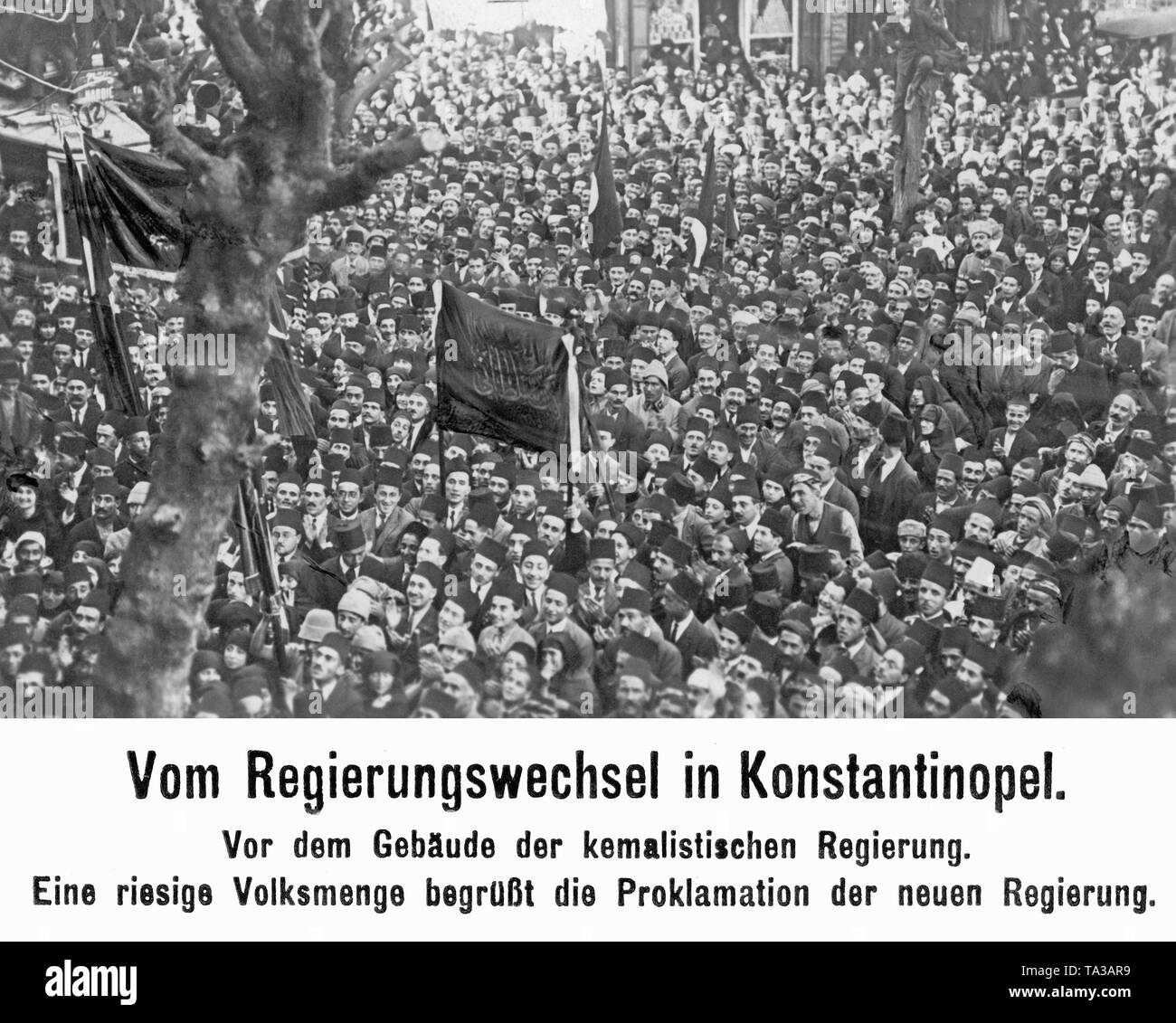 A jubilant crowd of people celebrates the change of government and ...