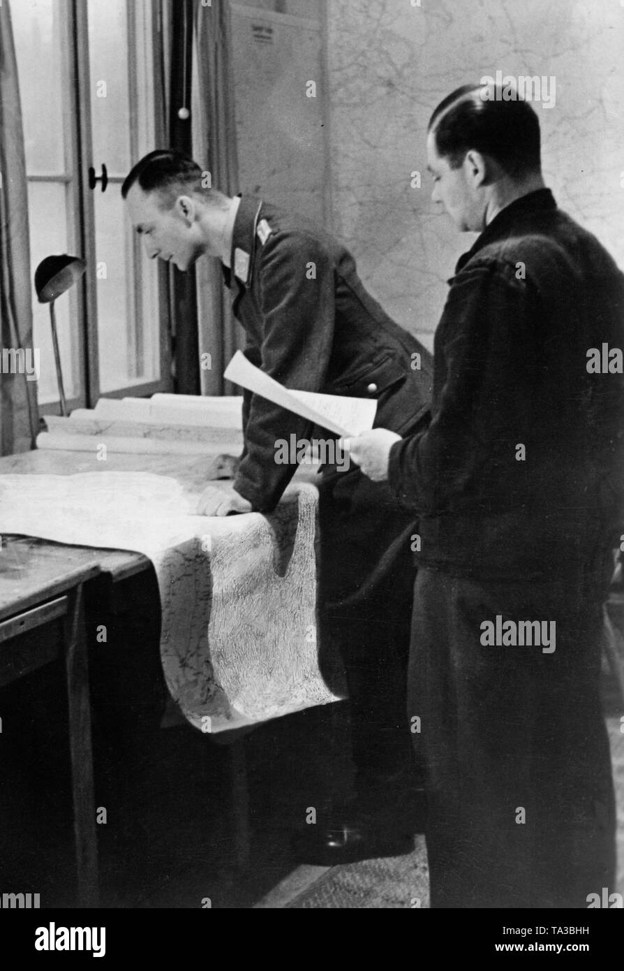 An orderly officer sends a message to the signal detachment for ...