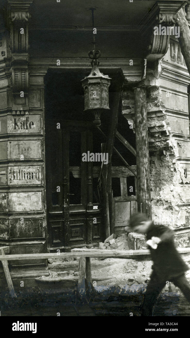 Entrance of a house destroyed by mines during the reconquest of Munich ...