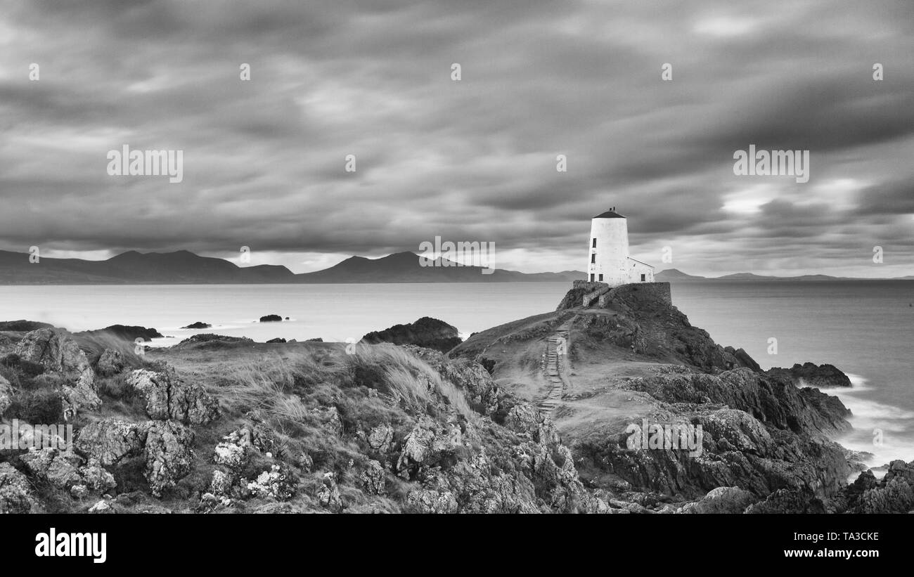 Llanddwyn Lighthouse Sunrise Stock Photo - Alamy