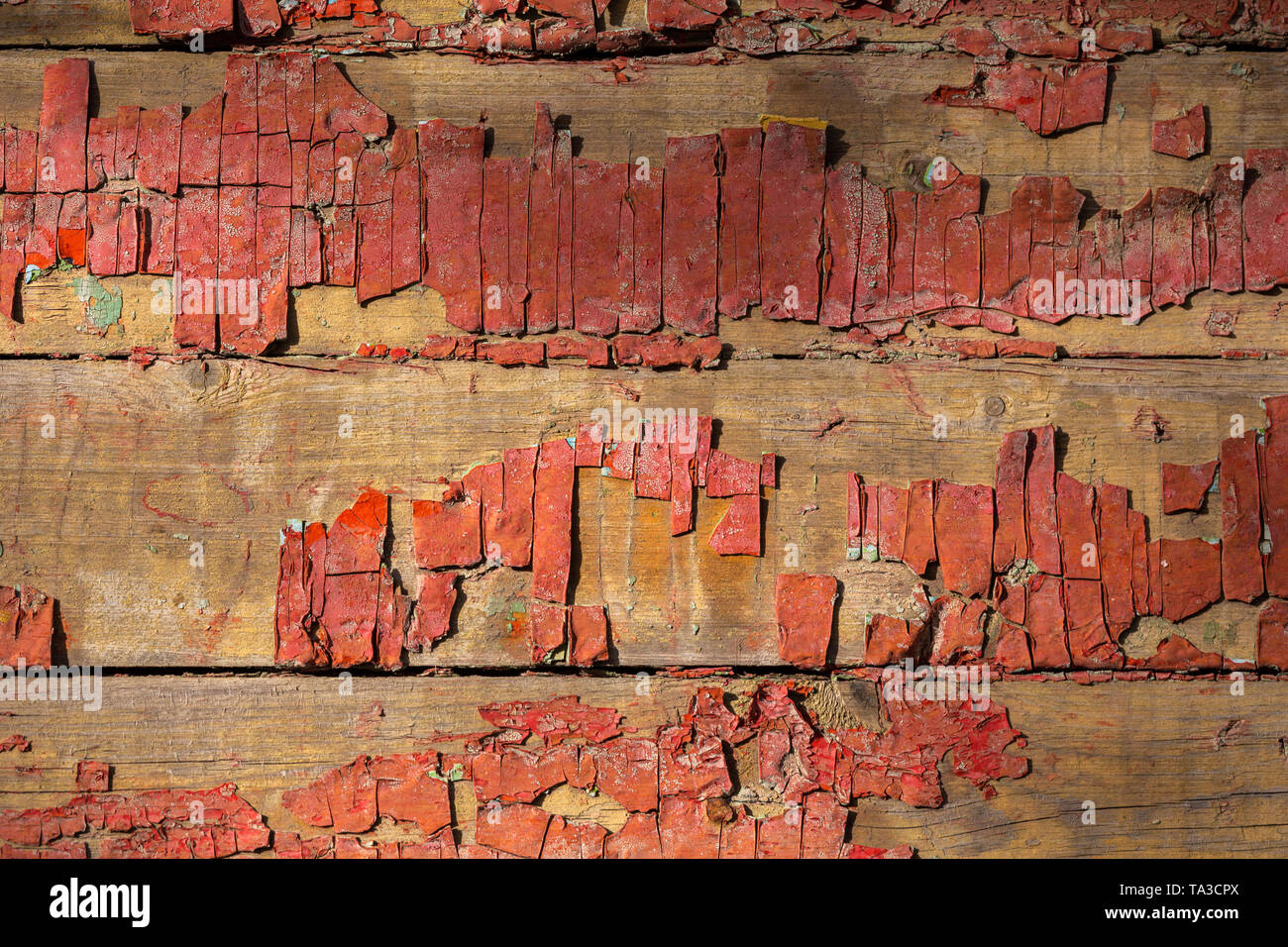 Peeling faded red paint on horizontal wooden planks Stock Photo - Alamy