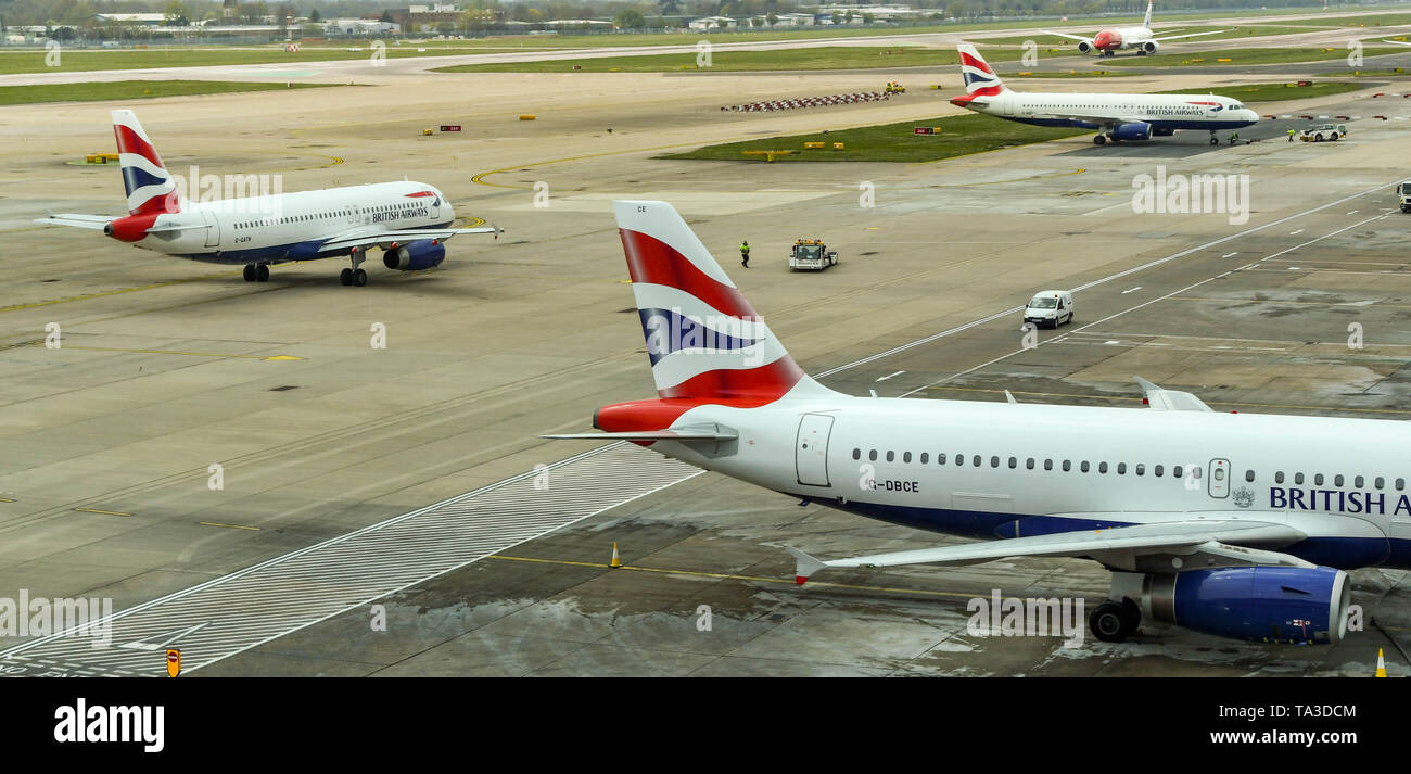 LONDON GATWICK AIRPORT, ENGLAND - APRIL 2019: British Airways jets at ...