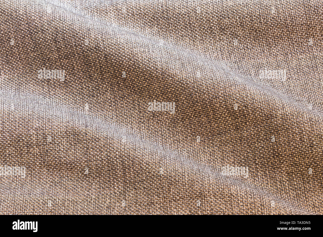 Brown waves dense rough fabric closeup background Stock Photo - Alamy