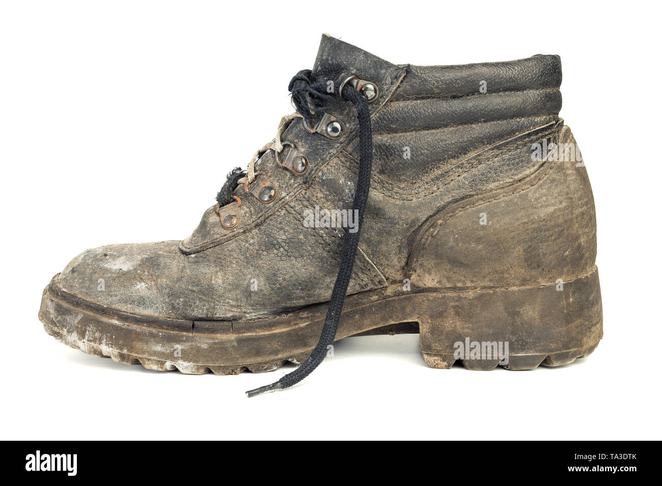 worn-out old work boot, isolated on white background with shadow Stock ...