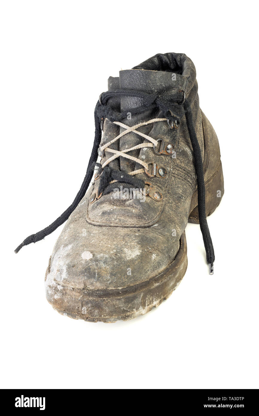 worn-out old work boot, isolated on white background with shadow Stock ...