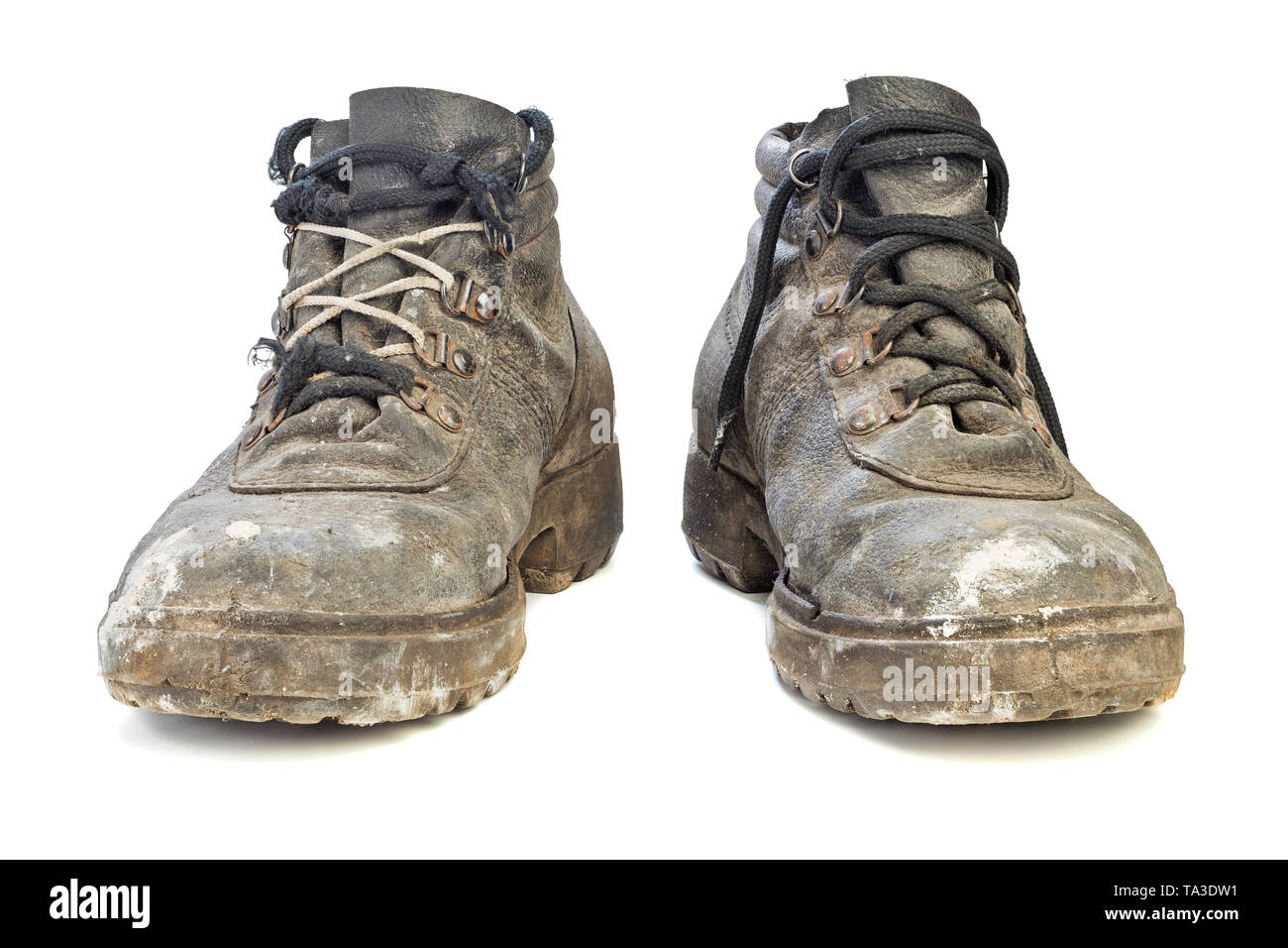 worn-out old work boots isolated on white background Stock Photo - Alamy