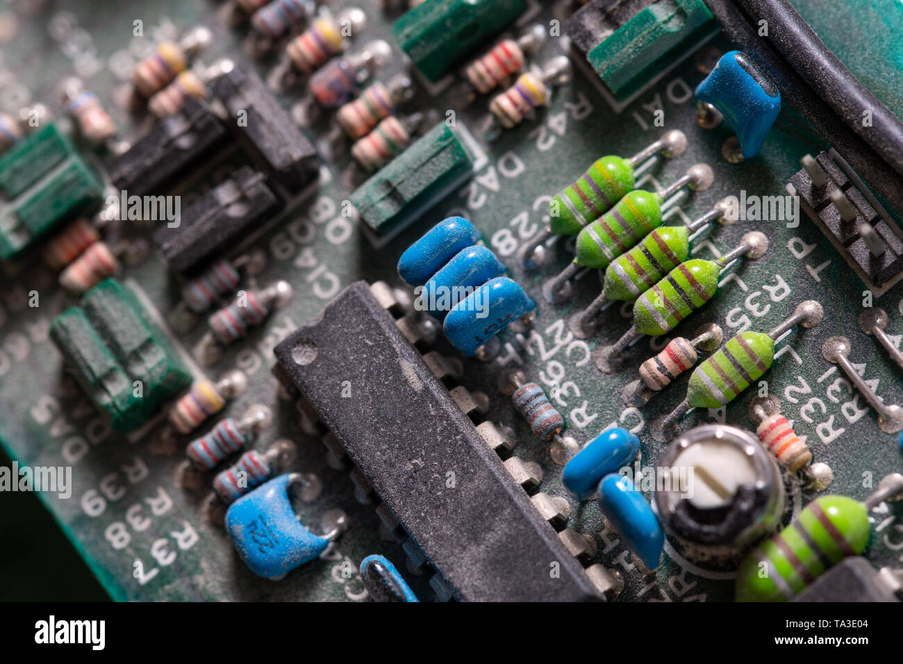 dark background of old electronic circuit board closeup with dus Stock ...