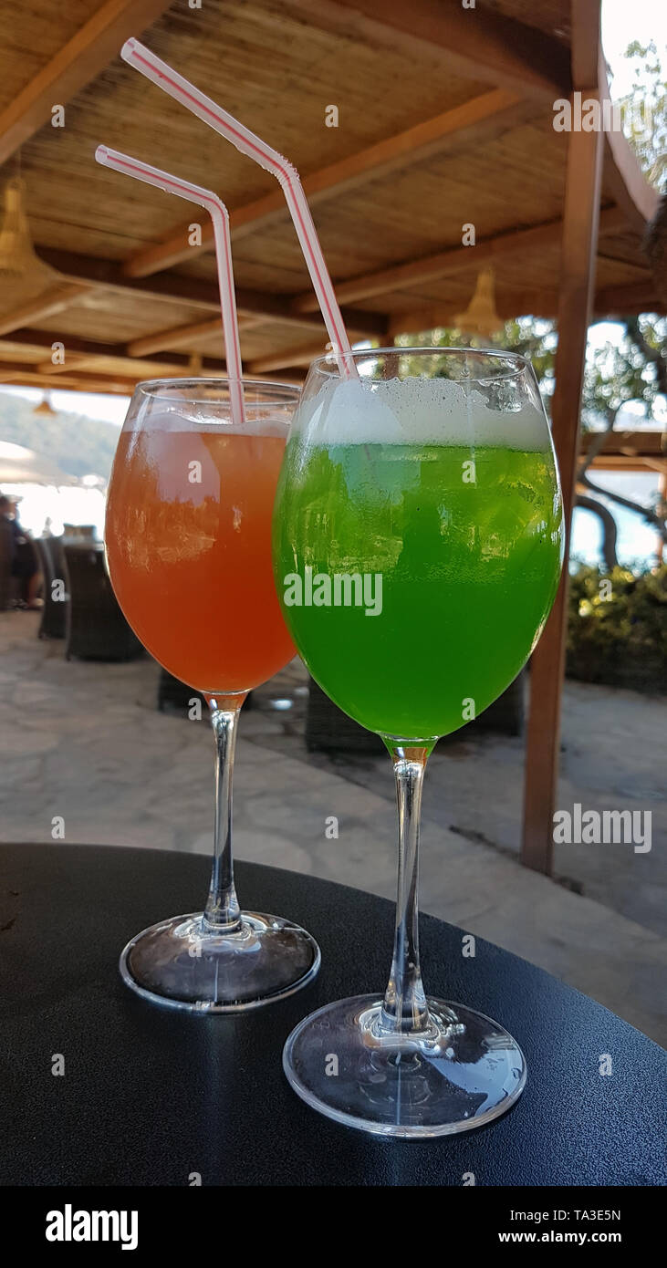 Colorful fresh coctails on a snack bar table Stock Photo - Alamy