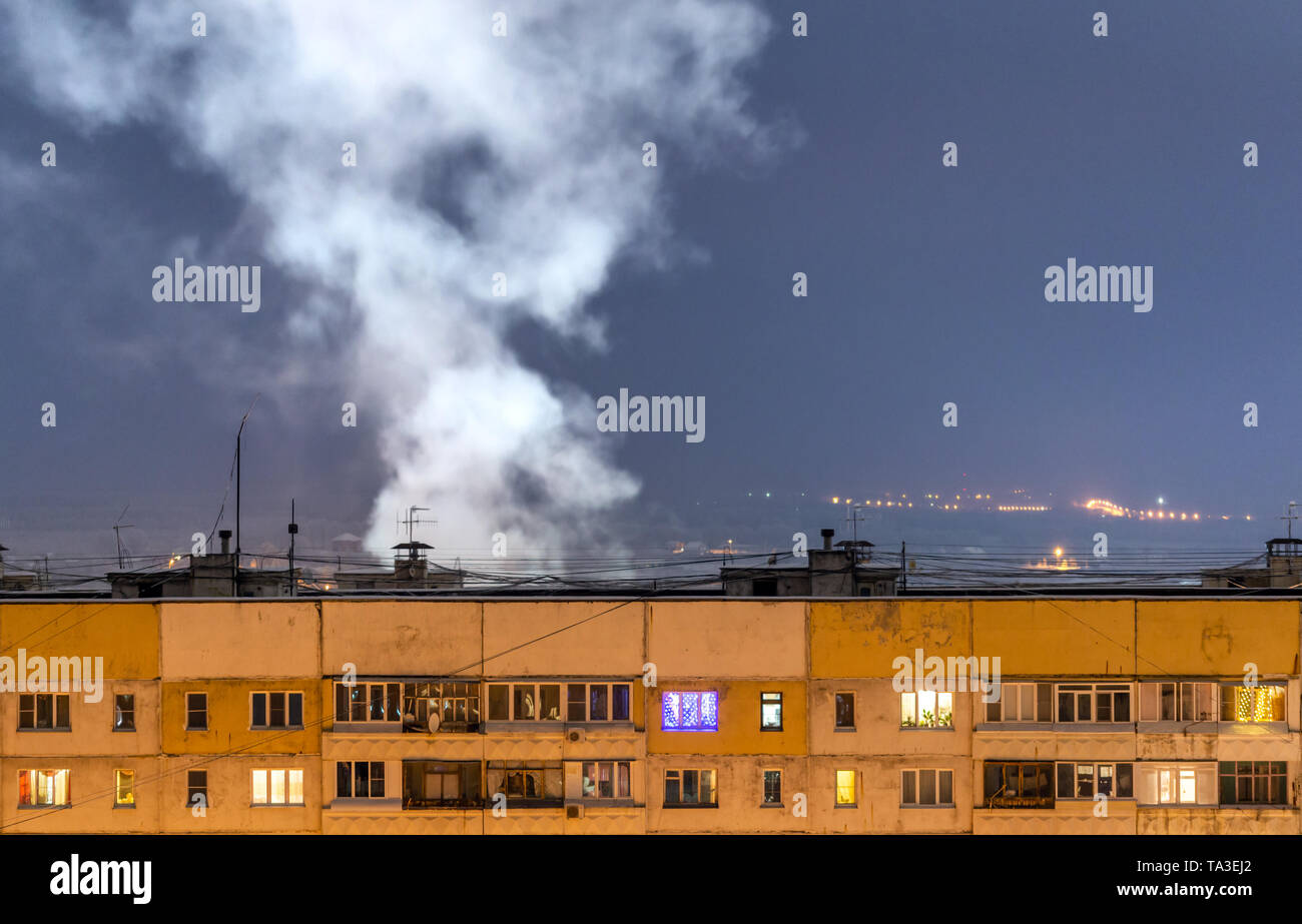 russian province high rise block houseroof with steam cloud Stock Photo ...
