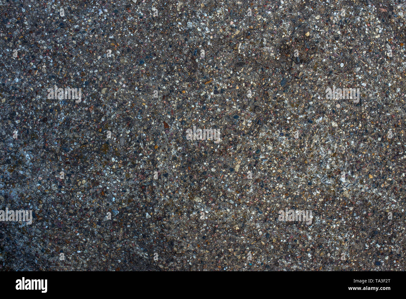 flat asphalt texture with colorful stones and tone gradient Stock Photo ...