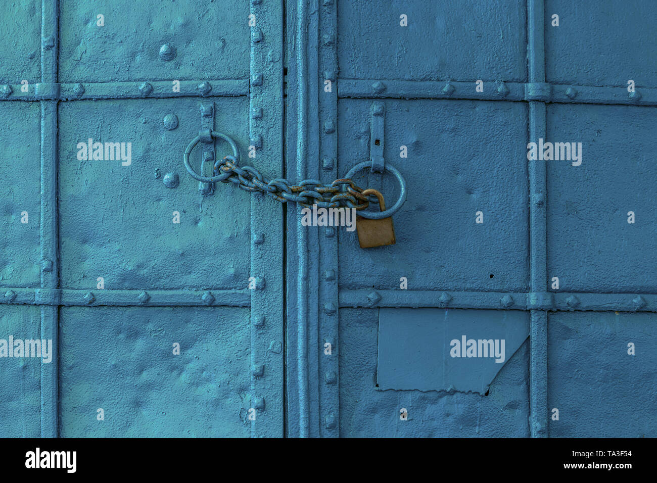 fresh painted old riveted door Stock Photo - Alamy