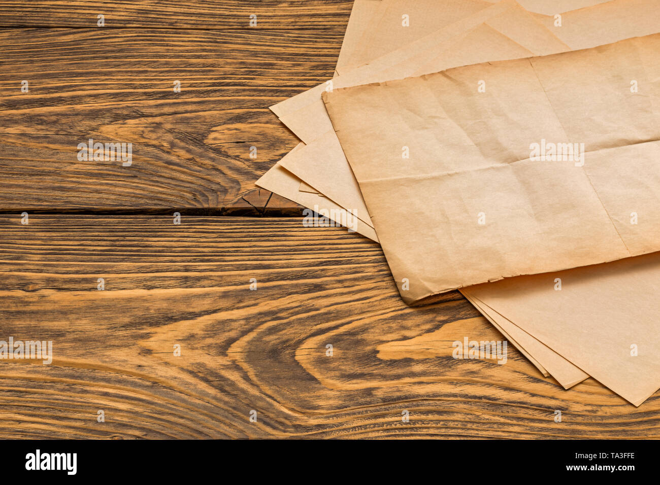 sheets of old paper on table Stock Photo - Alamy