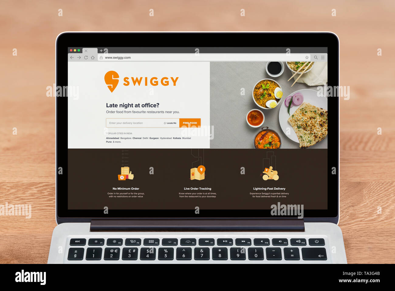 An Apple Macbook displays the Swiggy website (Editorial use only Stock ...