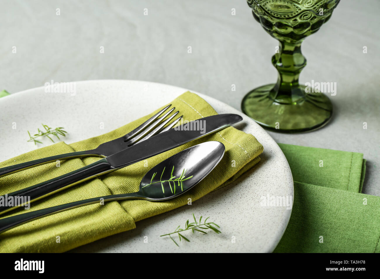 Simple table setting in restaurant Stock Photo - Alamy