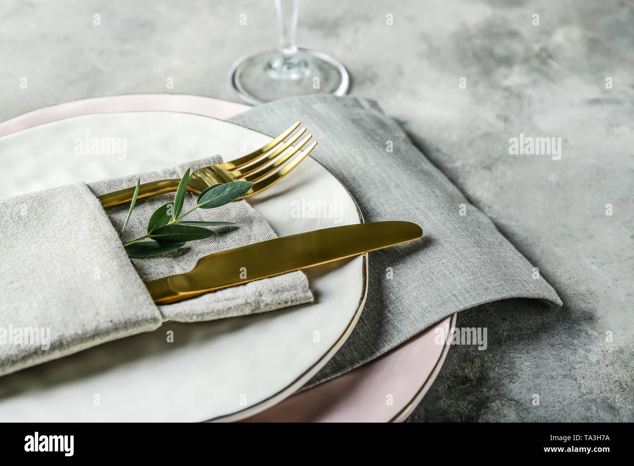 Simple table setting in restaurant Stock Photo - Alamy
