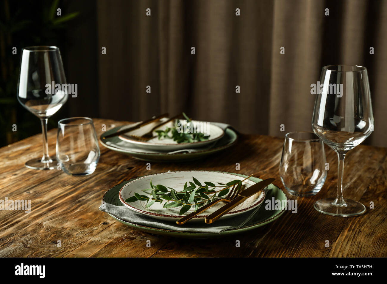 Simple table setting in restaurant Stock Photo - Alamy