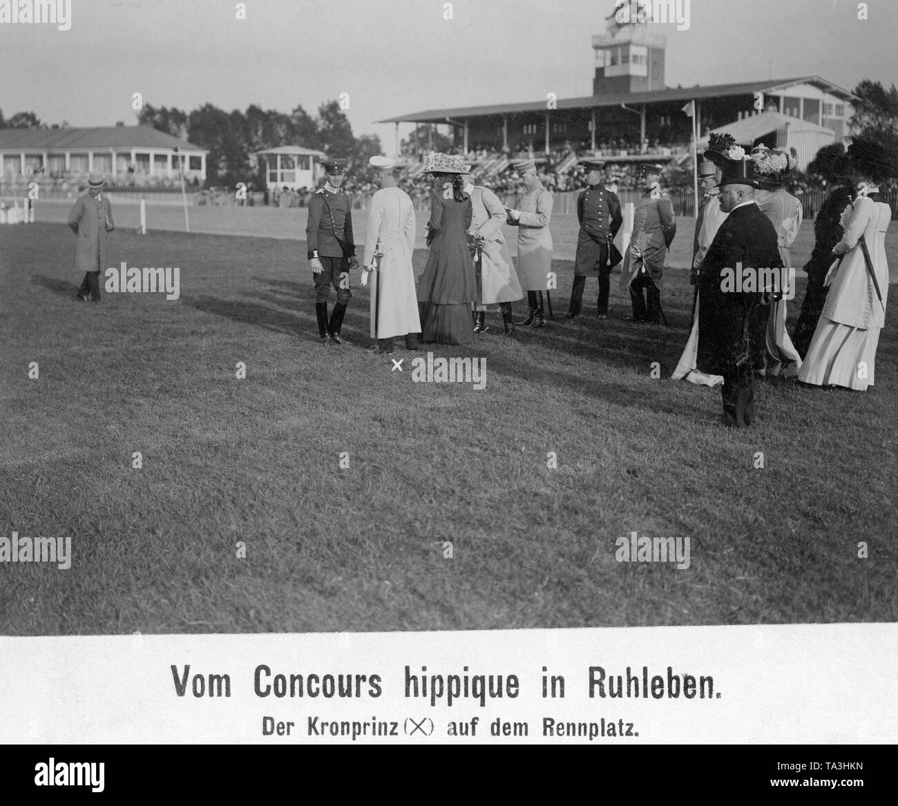 Crown Prince Wilhelm (3rd from the left with a light coat) during a ...
