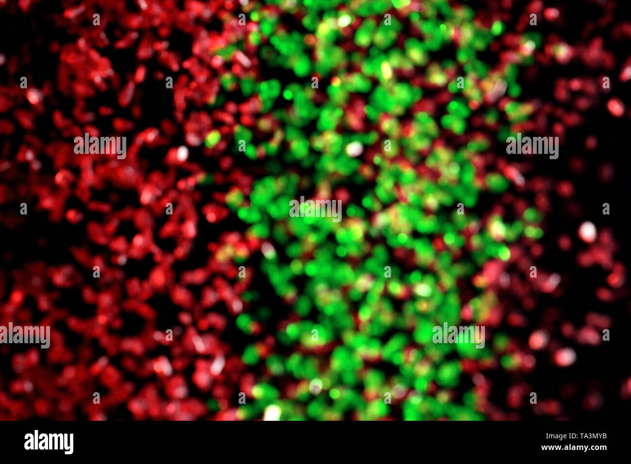 Green and red sparkly objects assorted into three columns Stock Photo ...