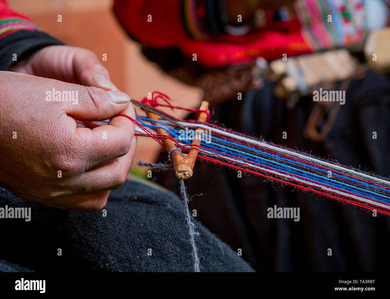 Woman using old weaving loom hi-res stock photography and images - Alamy