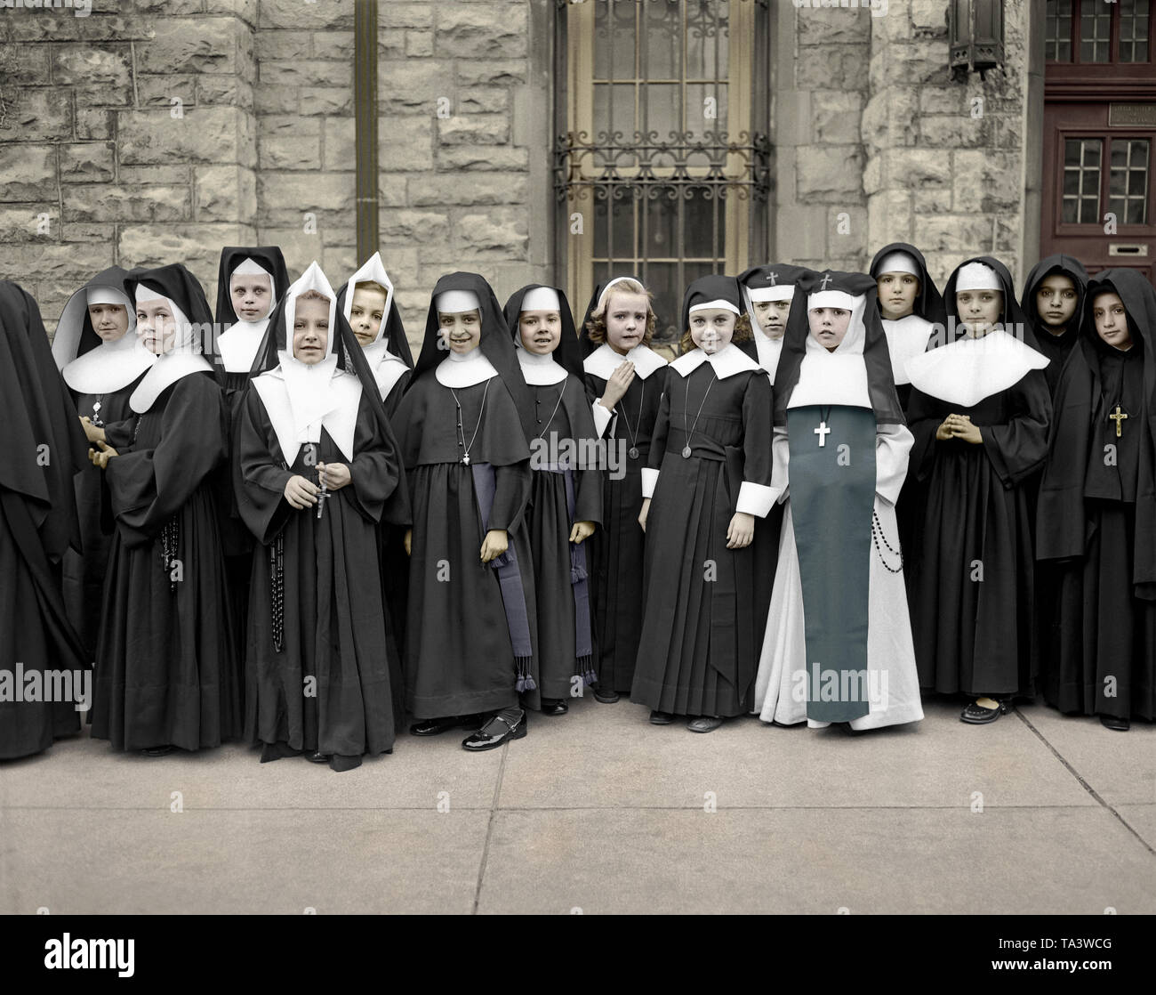 Little girls representing different orders of nuns, Chicago, IL 1954 ...