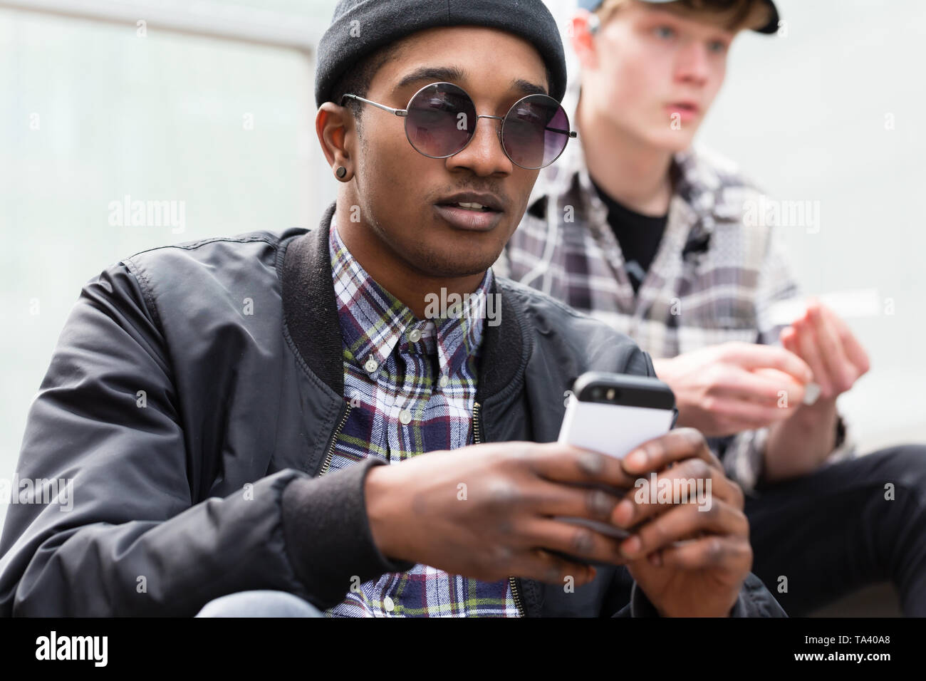 Fashionable young boy hi-res stock photography and images - Alamy