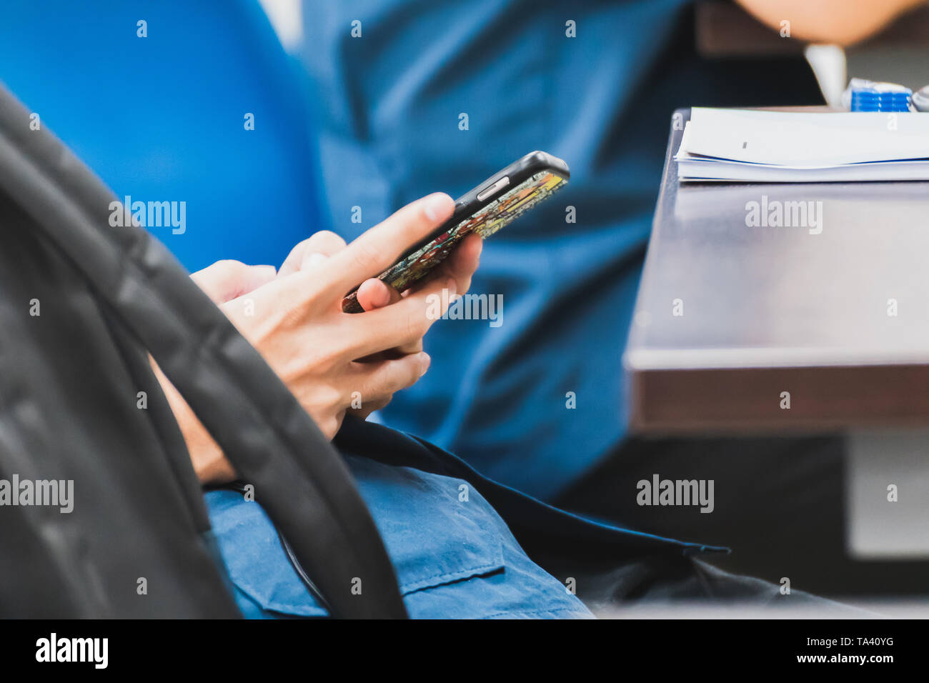 Phone under desk classroom hi-res stock photography and images - Alamy