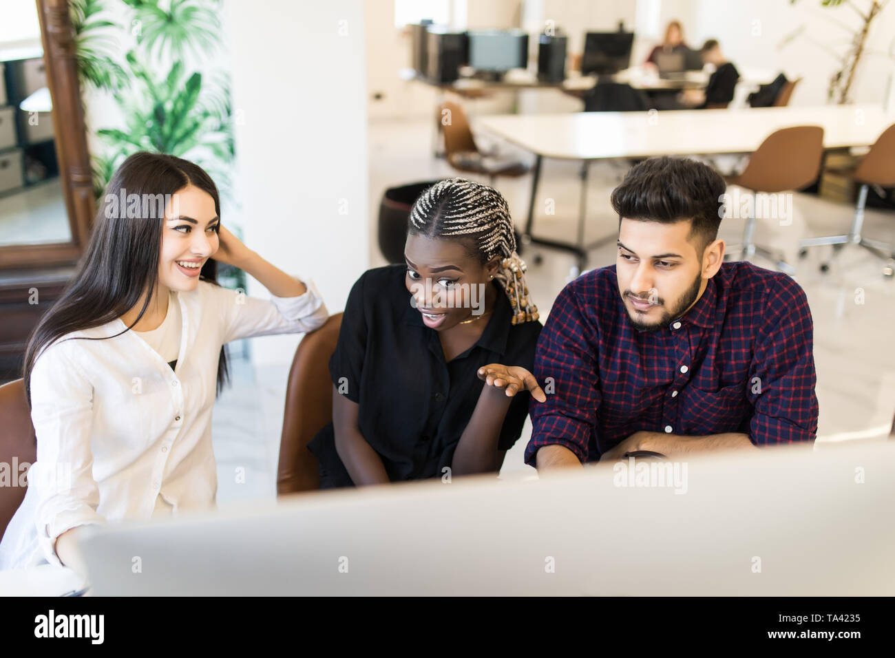 Focus on positive caucasian confident team leader mentor use computer ...