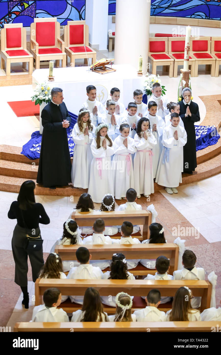 A child posing for the confirmation hi-res stock photography and images ...